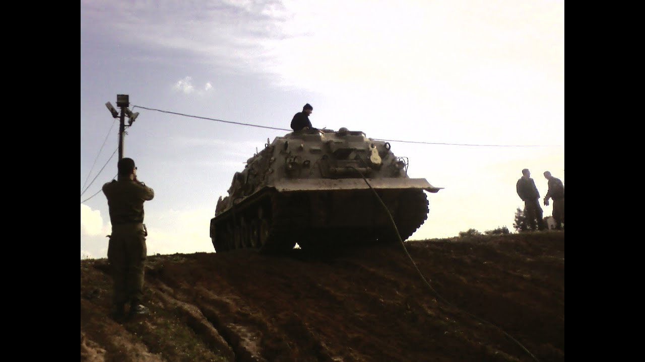 M88A1 recovery vehicle flipping Merkava tank - YouTube