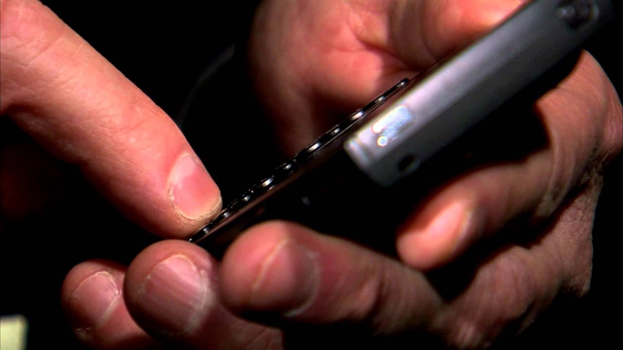 Extreme close up of man pushing buttons on cell phone. - YouTube