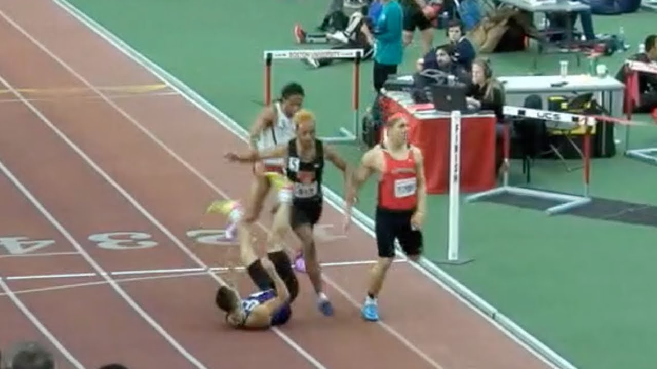Runner Pushed Over Finish Line In 400m Race - YouTube