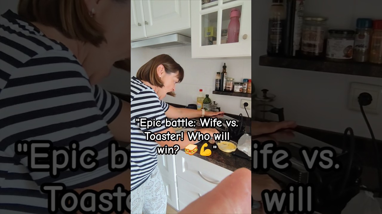 "Epic battle: Wife vs. Toaster! Who will win? 🥪💪"#couplescomedy # ...