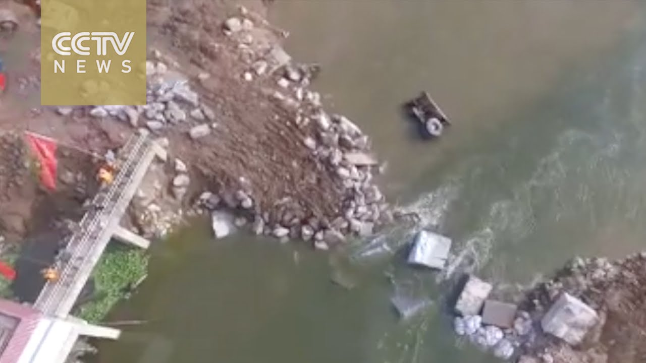 Breached levee restored after 45-hour repair job - YouTube