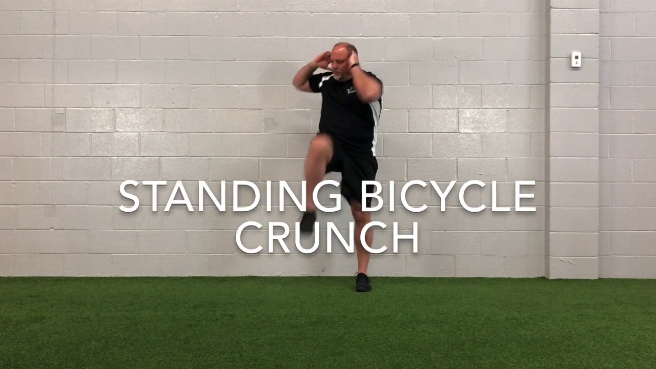 STANDING BICYCLE CRUNCH - YouTube