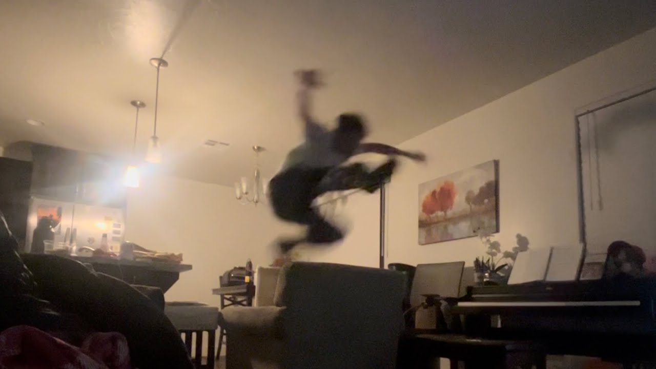 Jumping over an arm chair 4 times - YouTube