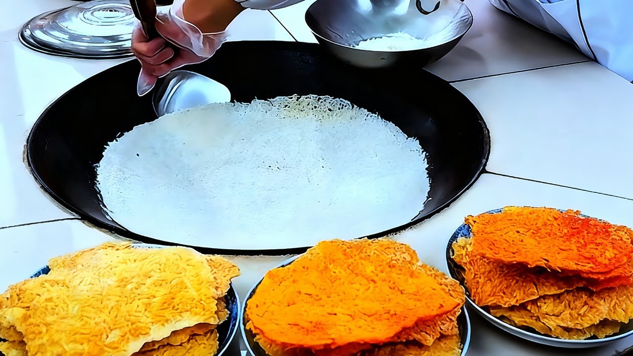 How a Giant Wok Makes the Crispiest Rice - YouTube