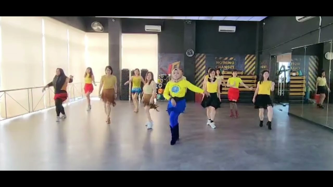 Dance In The Rain Line Dance Demo by Lora & D'Vizta Mutiara - YouTube