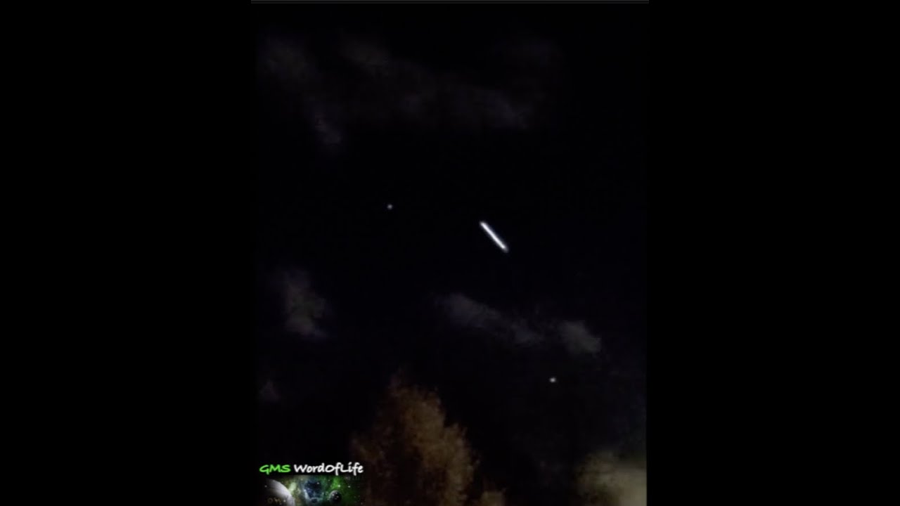 An Illuminated Flying Roll Can Be Seen Moving Through The Night Skies ...