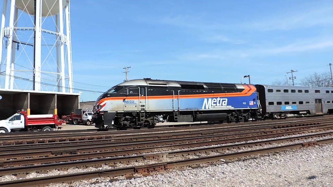 Metra engine 413 a MP36PH-3S leads a outbound train in Franklin Park ...