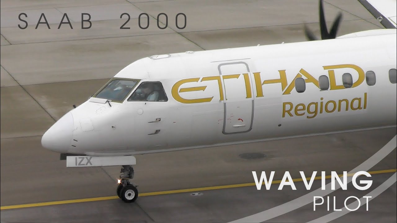 Darwin Airline Saab 2000 Waving Pilots & Turnaround at ZRH - YouTube