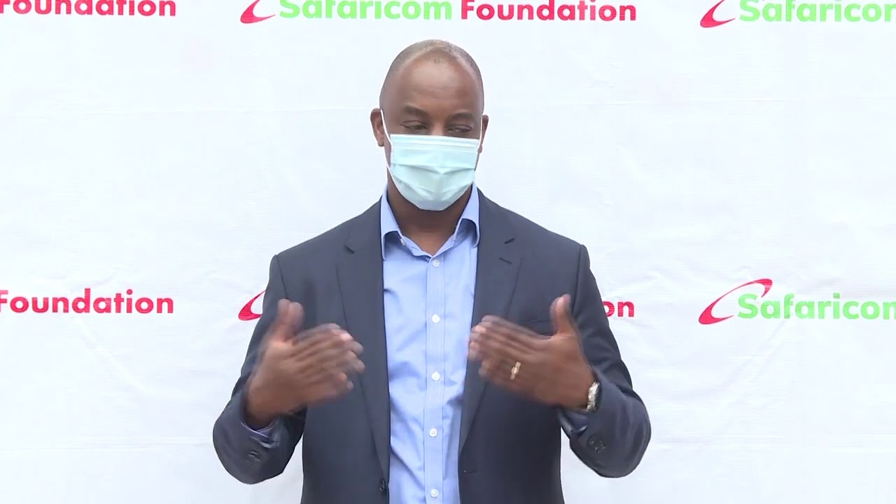 Mr Steve Chege - Safaricom Foundation Trustee donating to Kibondeni ...
