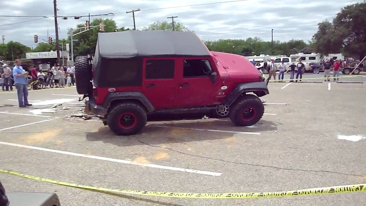 jeep wrangler running over cars - YouTube