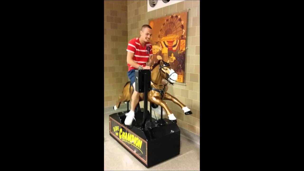 Riding a mechanical horse - YouTube