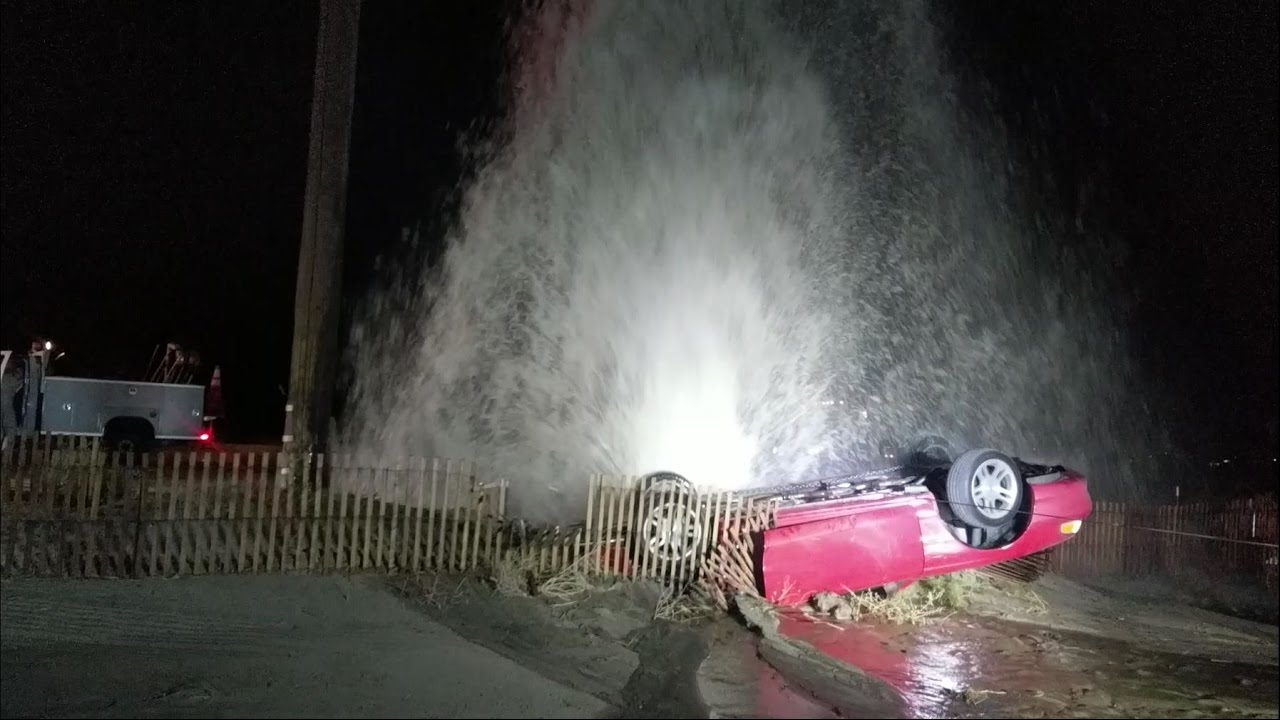 Car rolls on top of a Fire Hydrant - YouTube