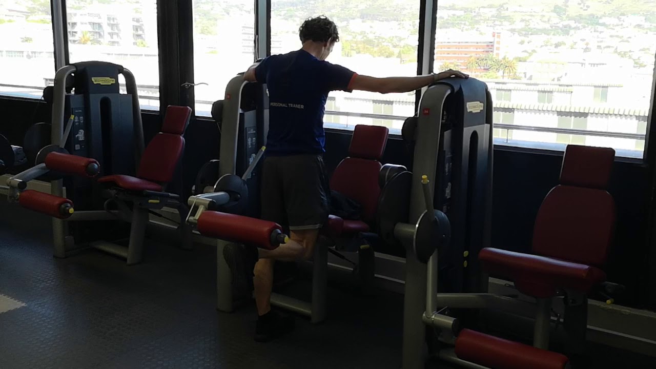 Standing hamstring curl - using leg extension machine - YouTube