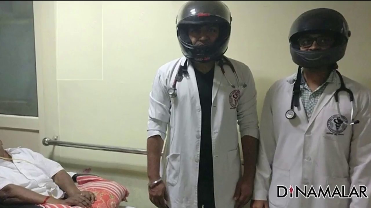 AIIMS Doctors wear helmets to Work - YouTube