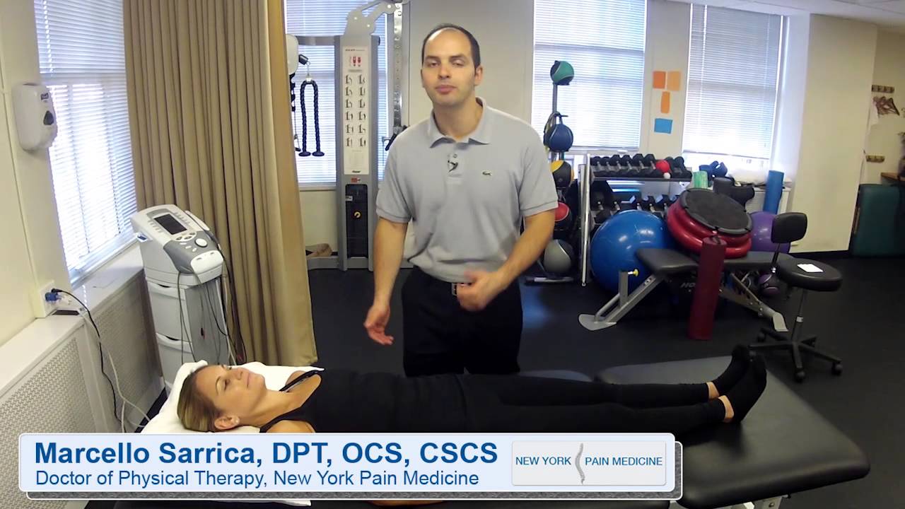 Lumbar Roll Mobilization Demonstration at New York Pain Medicine - YouTube