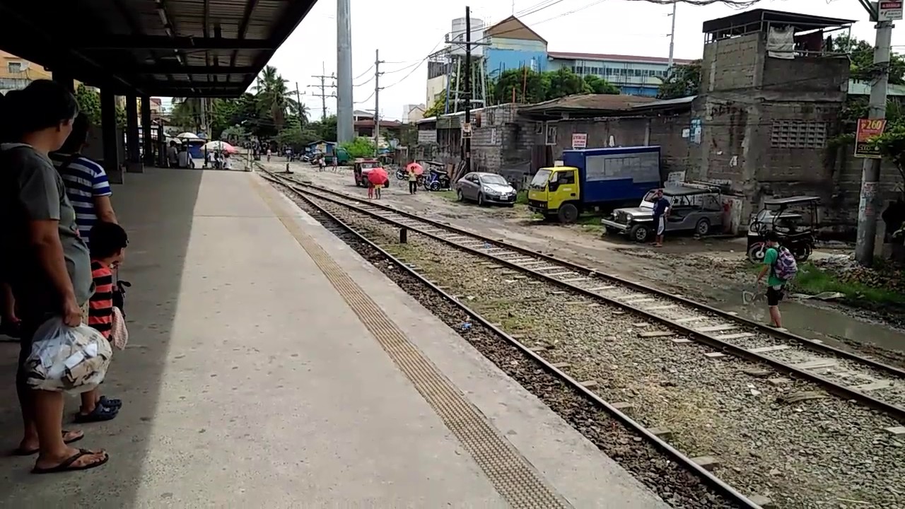 PNR DMU arriving in Alabang station platform - YouTube