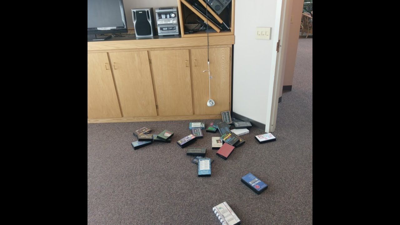 Shelf collapse yanks camera off wall - YouTube