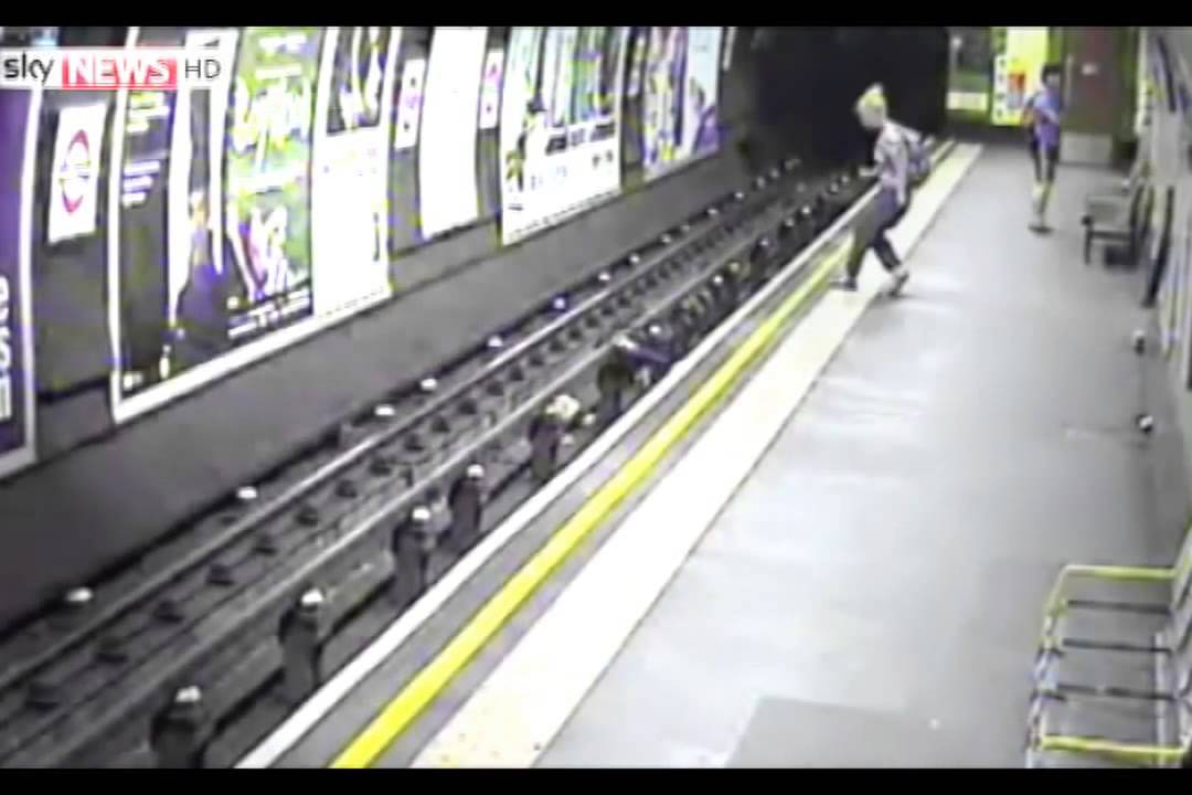 Child Falls in on The Tracks in Front of Train, Mother Saved - YouTube