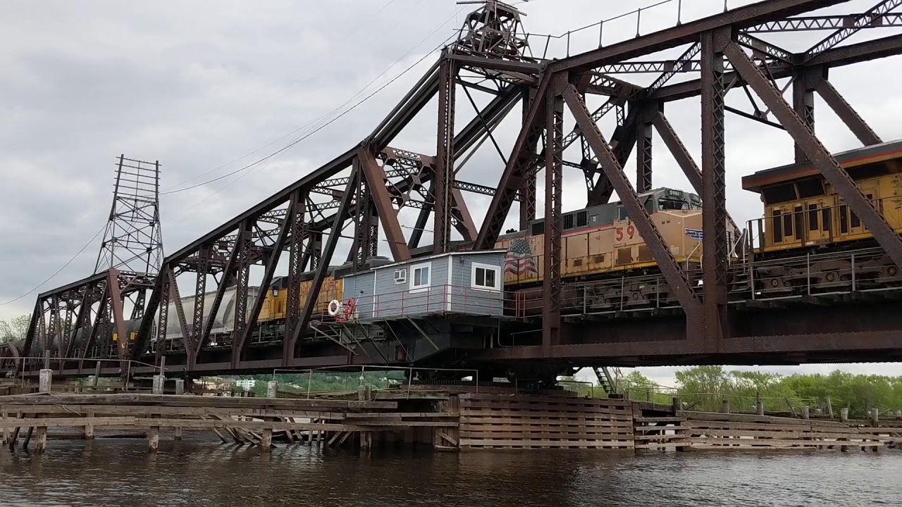 Train over twist bridge in Hudson, WI - YouTube
