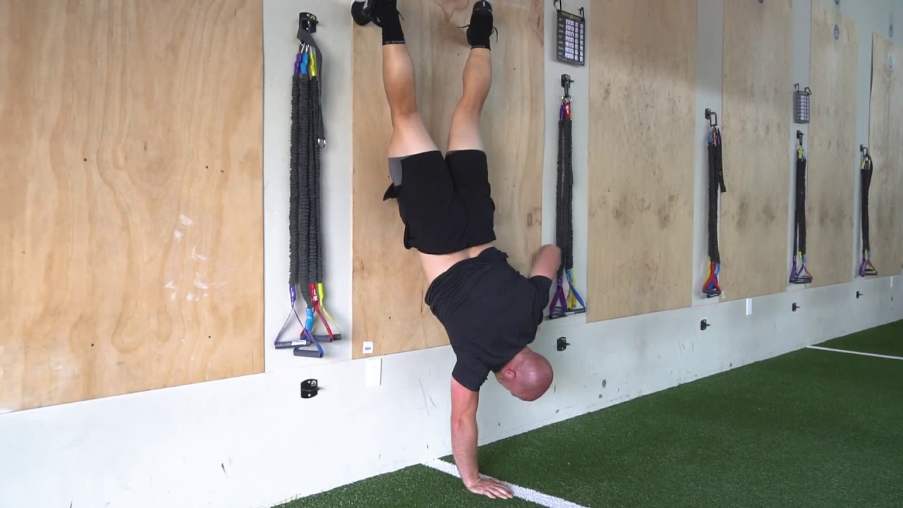 Single arm wall handstand hold - YouTube