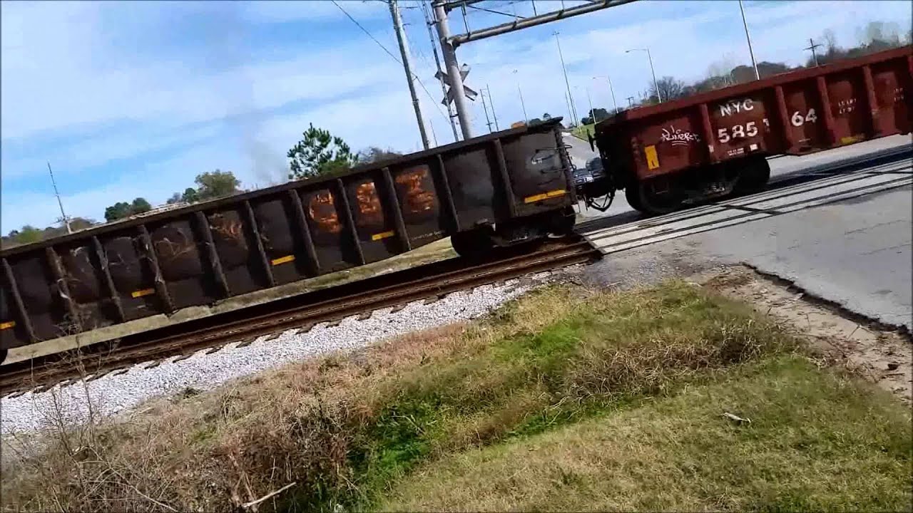TSRR 1962, TSRR 1955, and TSRR 1974 pull a TSRR Mixed Freight across Veterans Drive in Florence ...
