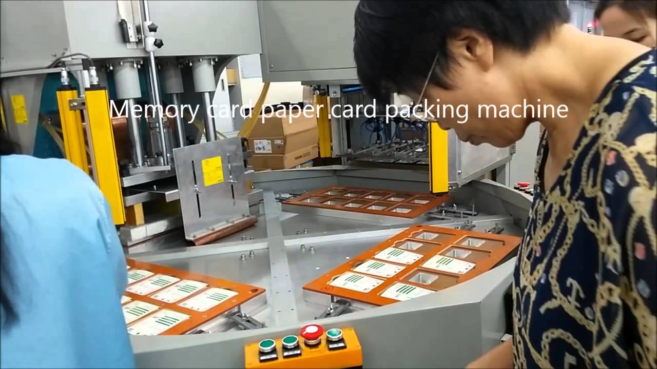 Memory card paper card packing machine - YouTube
