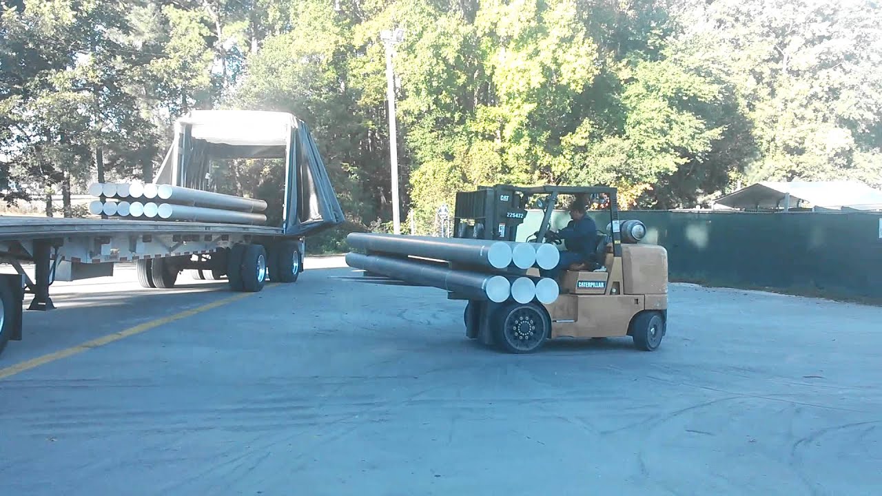 Unloading my load of aluminum pipe - YouTube