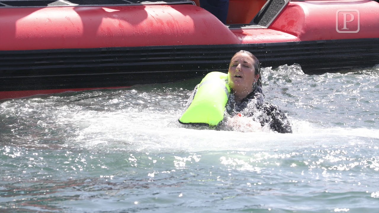 Self inflating life vest demonstration - YouTube