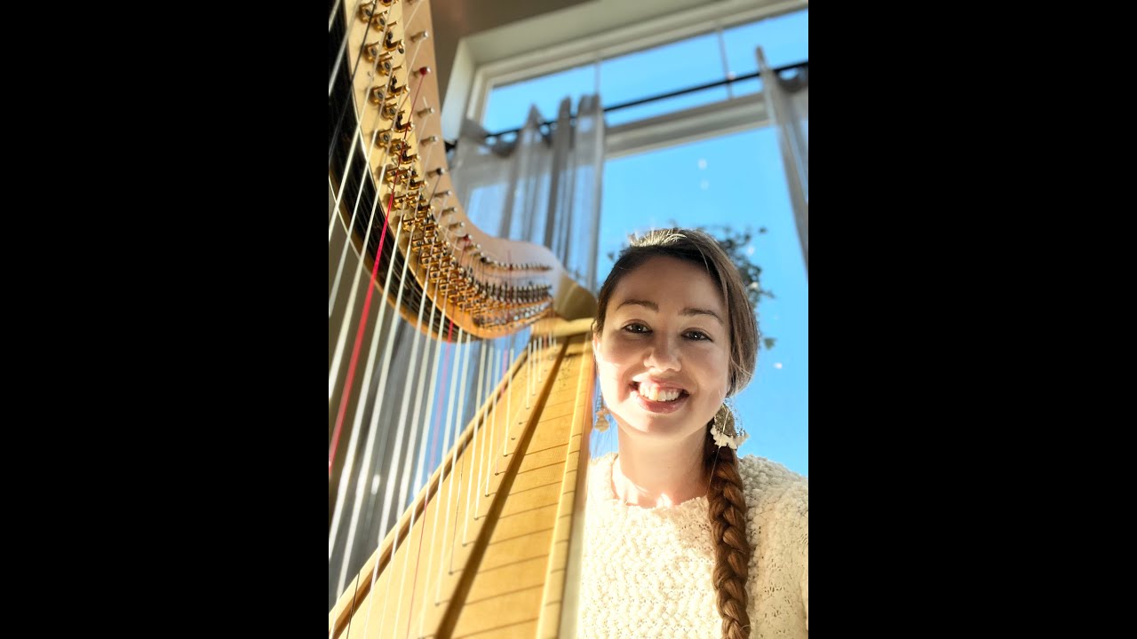 Yiskah sings “O Come Emanu’El” on harp at Ten Arrows Coffee & Bistro in ...