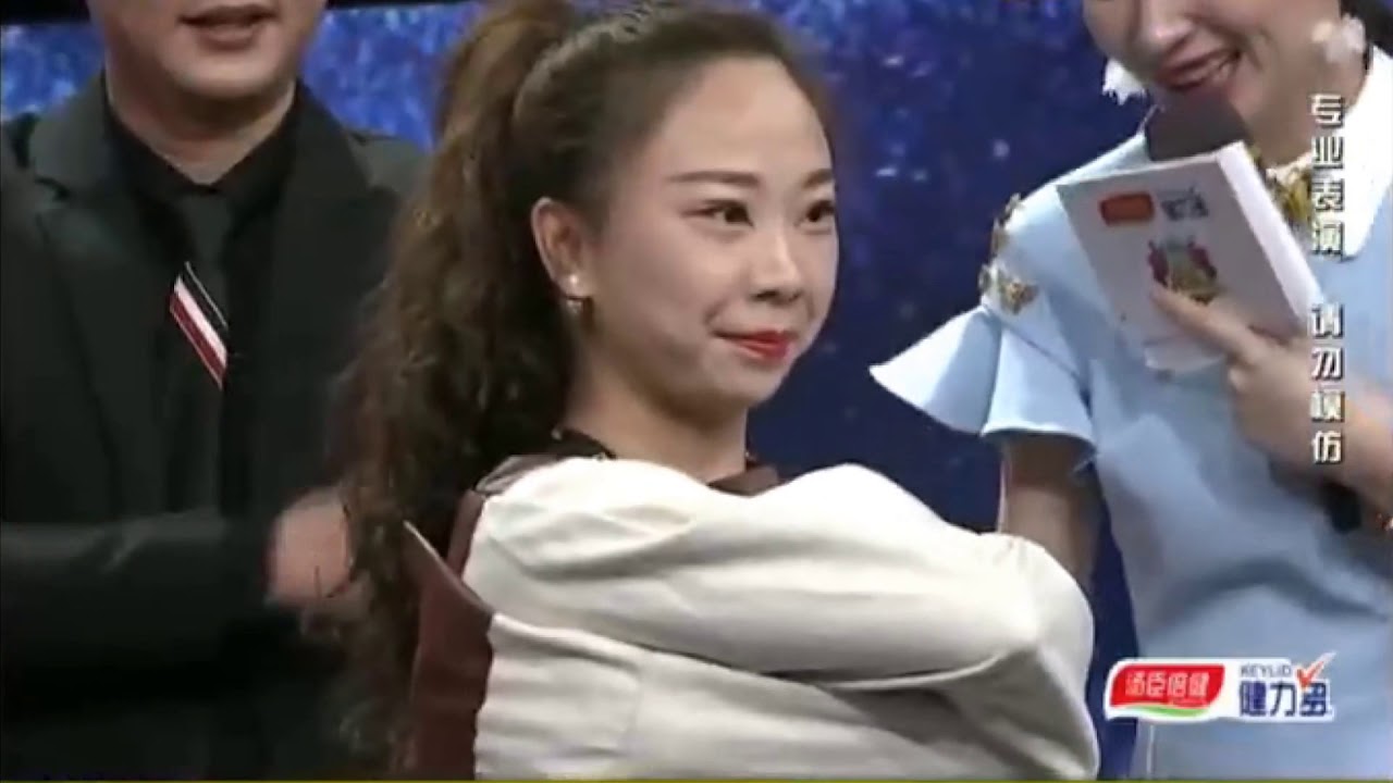 Shanghai Female Magician | Escape from Straitjacket - YouTube
