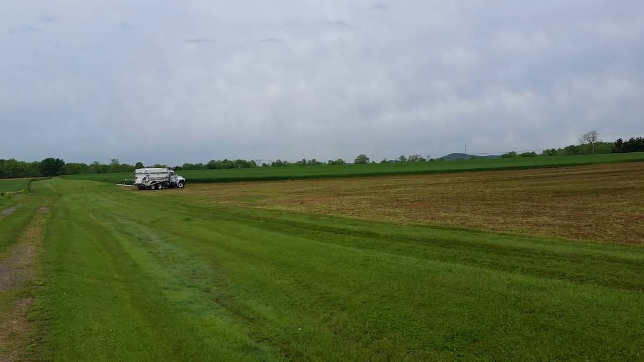 Spreading lime on Alfalfa field 2016 - YouTube