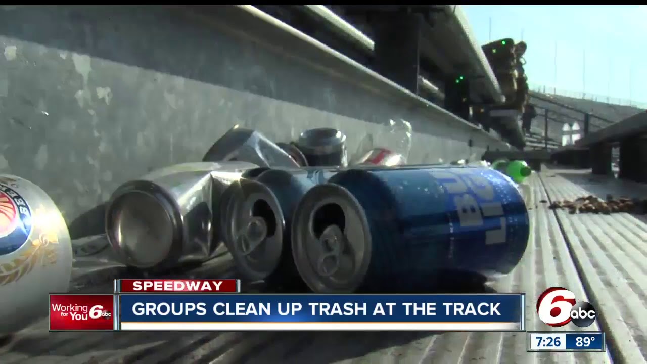 Volunteers help clean up stands at the Indianapolis Motor Speedway ...