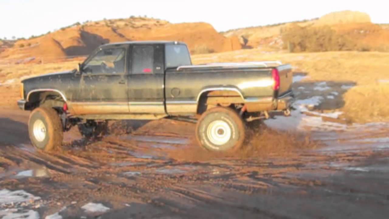 Lifted SAS GMC Playin in the dirt - YouTube
