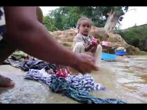Washing Clothes At The River - YouTube