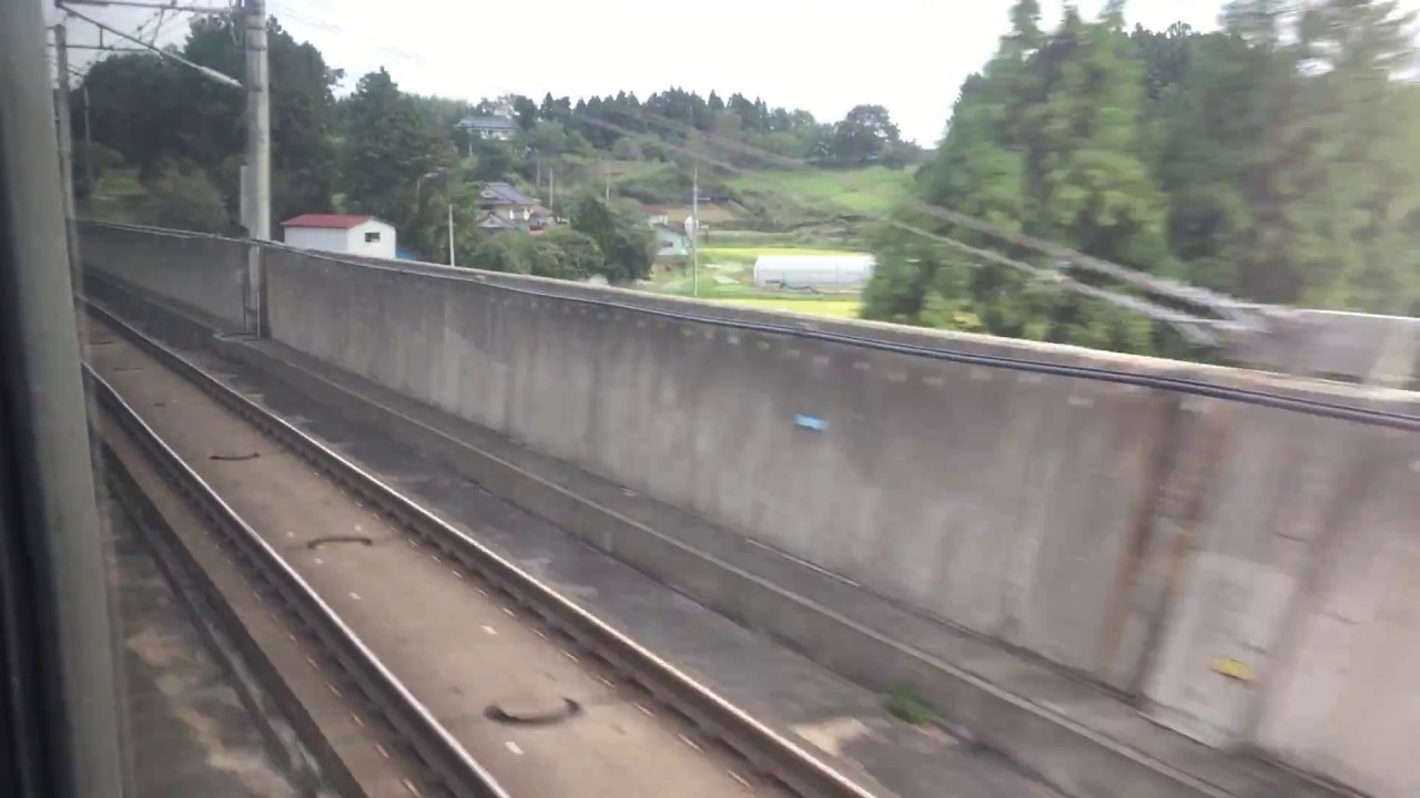 Shinkansen Hayabusa train travelling 320 km/h on Tohoku Shinkansen line ...