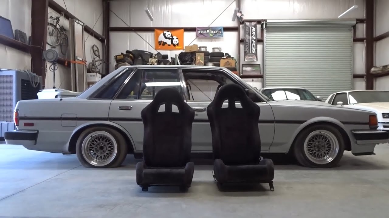 Installing aftermarket seats into my 85' Toyota Cressida - YouTube