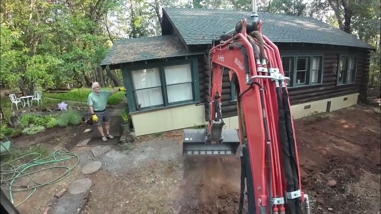 Topsoil and backfilling with the Kubota KX 040 4 - YouTube