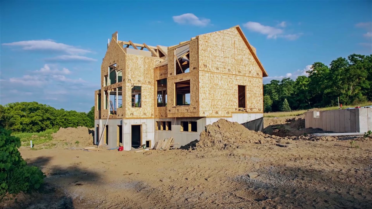 Steps to Building a Timber Frame Home Part 3: SIP Application - YouTube