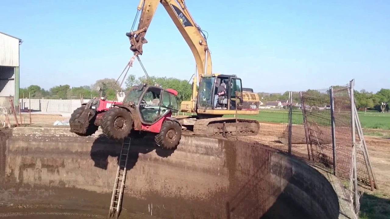 Levage d'un telesco à l'aide d'une pelleteuse - YouTube