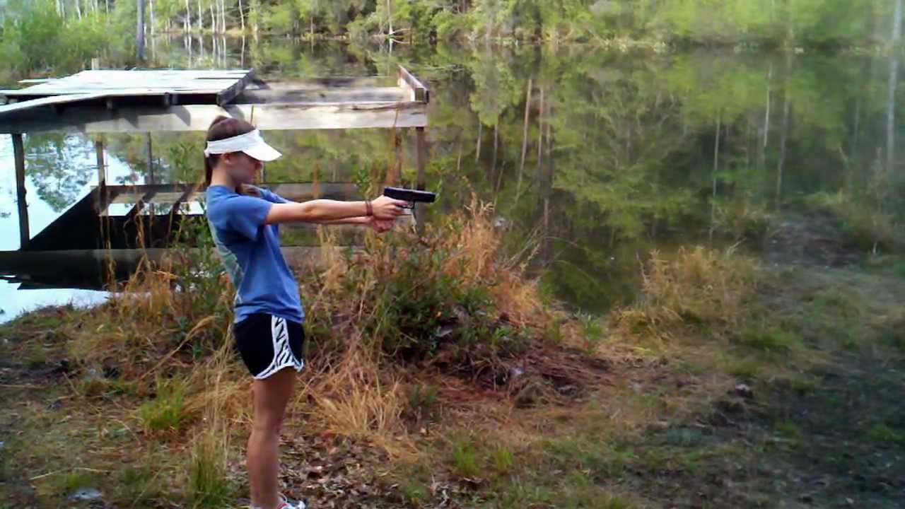 pretty girl shooting glock 22 - YouTube