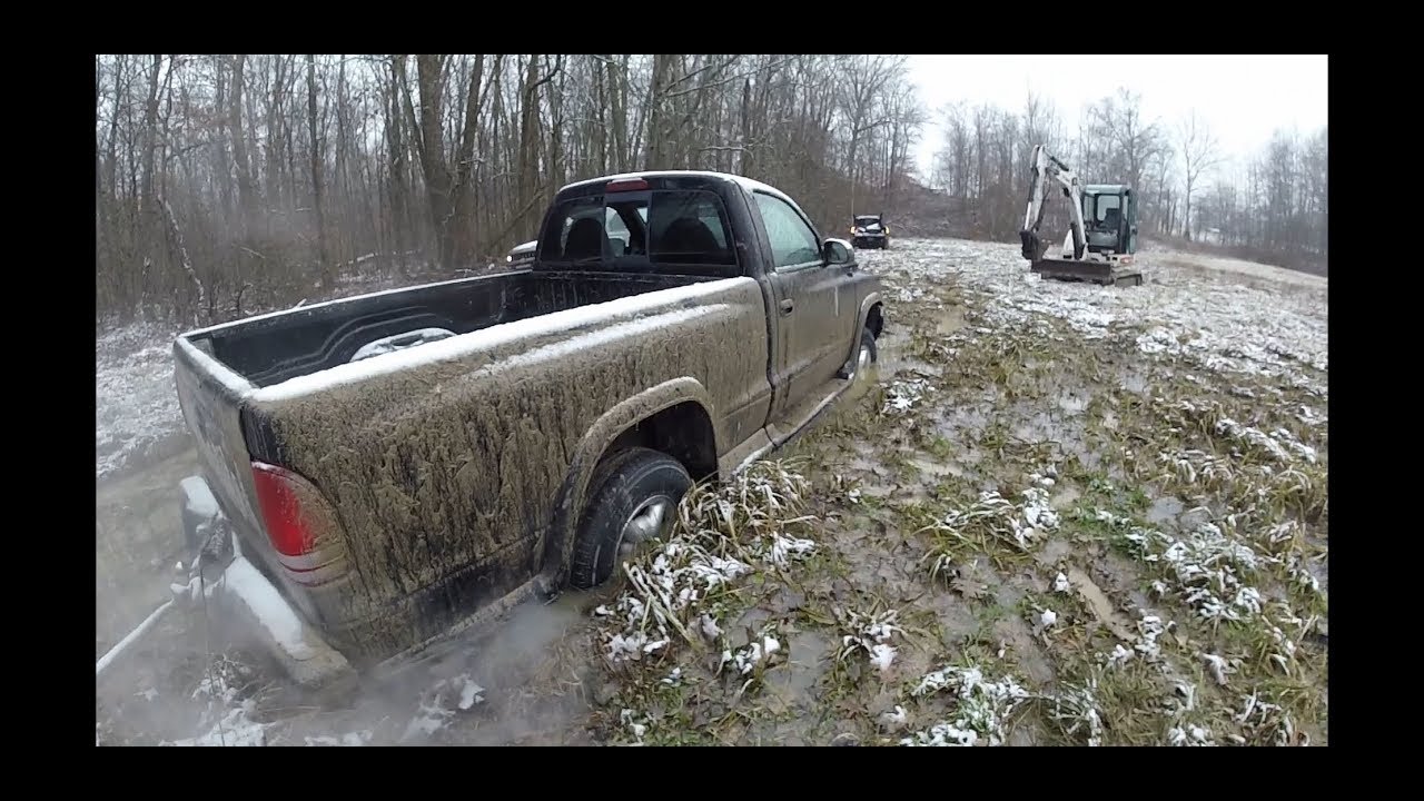 #2 Recovering 3 trucks stuck in mud. - YouTube