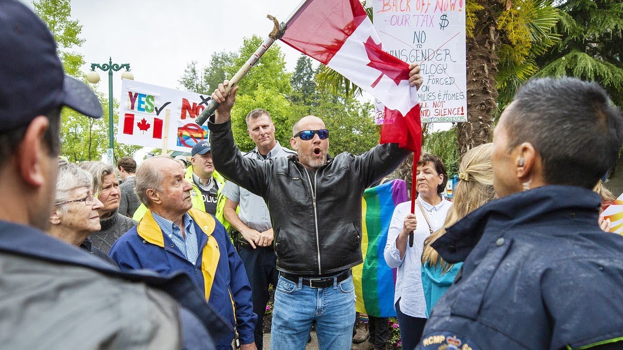 Angry scene unfolds at Pride flag raising in Surrey, B.C. - YouTube