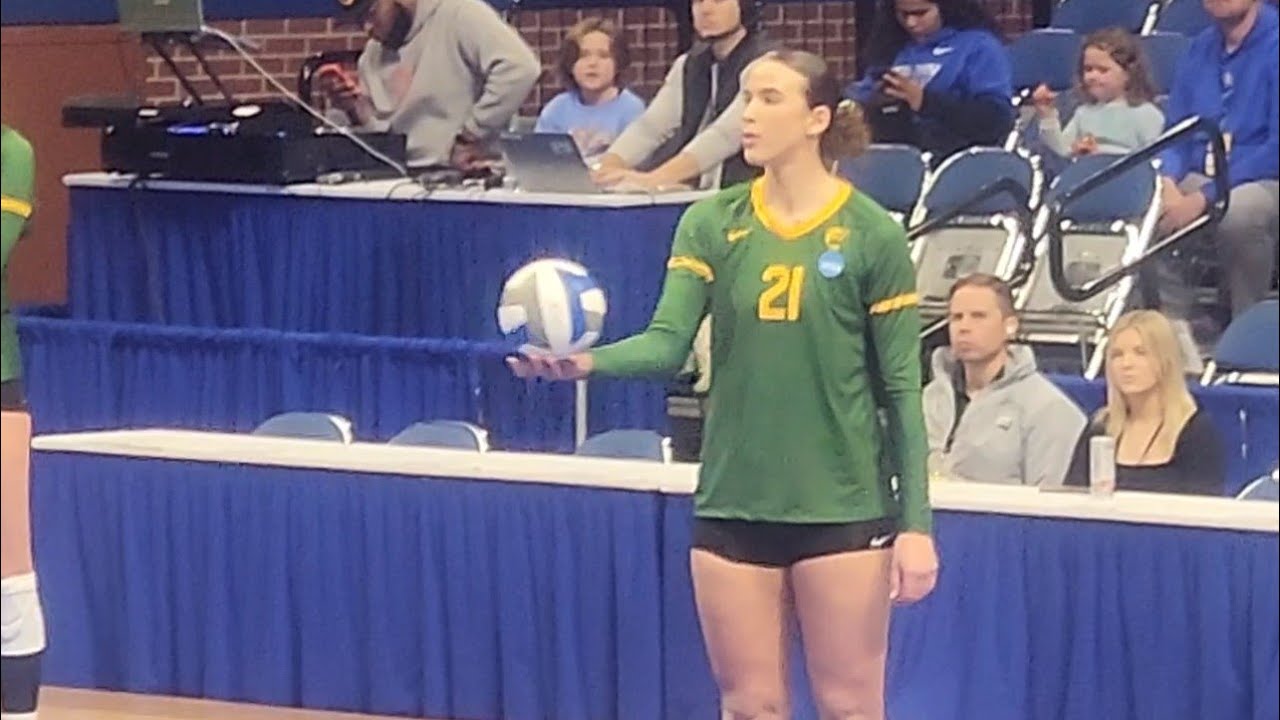 Elise McGhee of Baylor volleyball serving at match against JMU ...