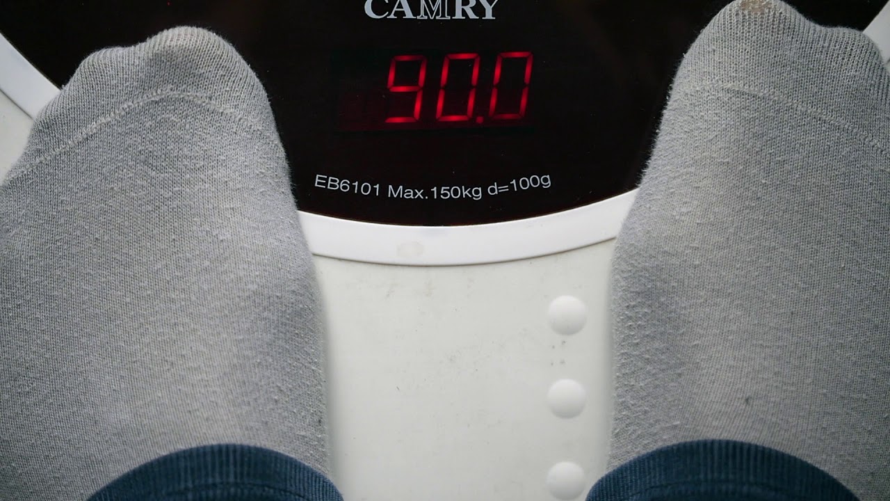 Stepping on weighing scales. Free HD video footage - YouTube