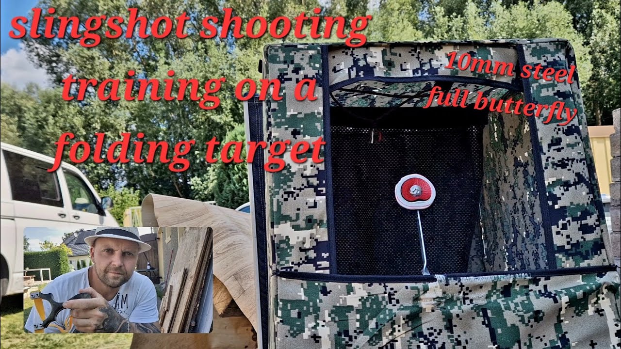 slingshot shooting on a folding target, full butterfly 10mm steel ammo ...