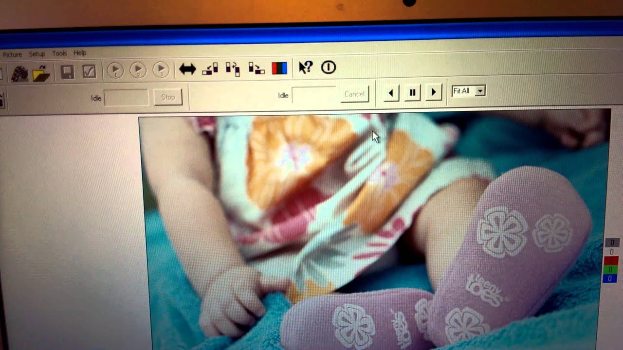 Scanning a roll of film with the Kodak Pakon F135 - YouTube