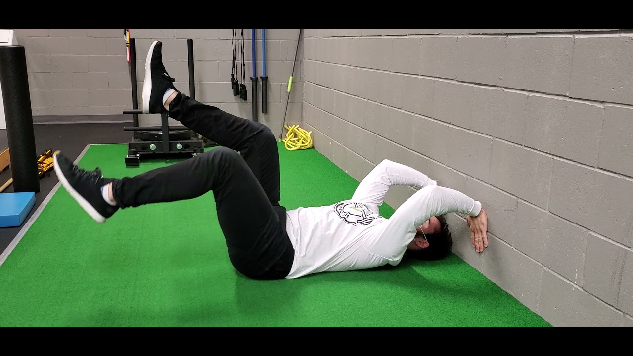 Hand On Wall Dead Bug Heel Taps - YouTube