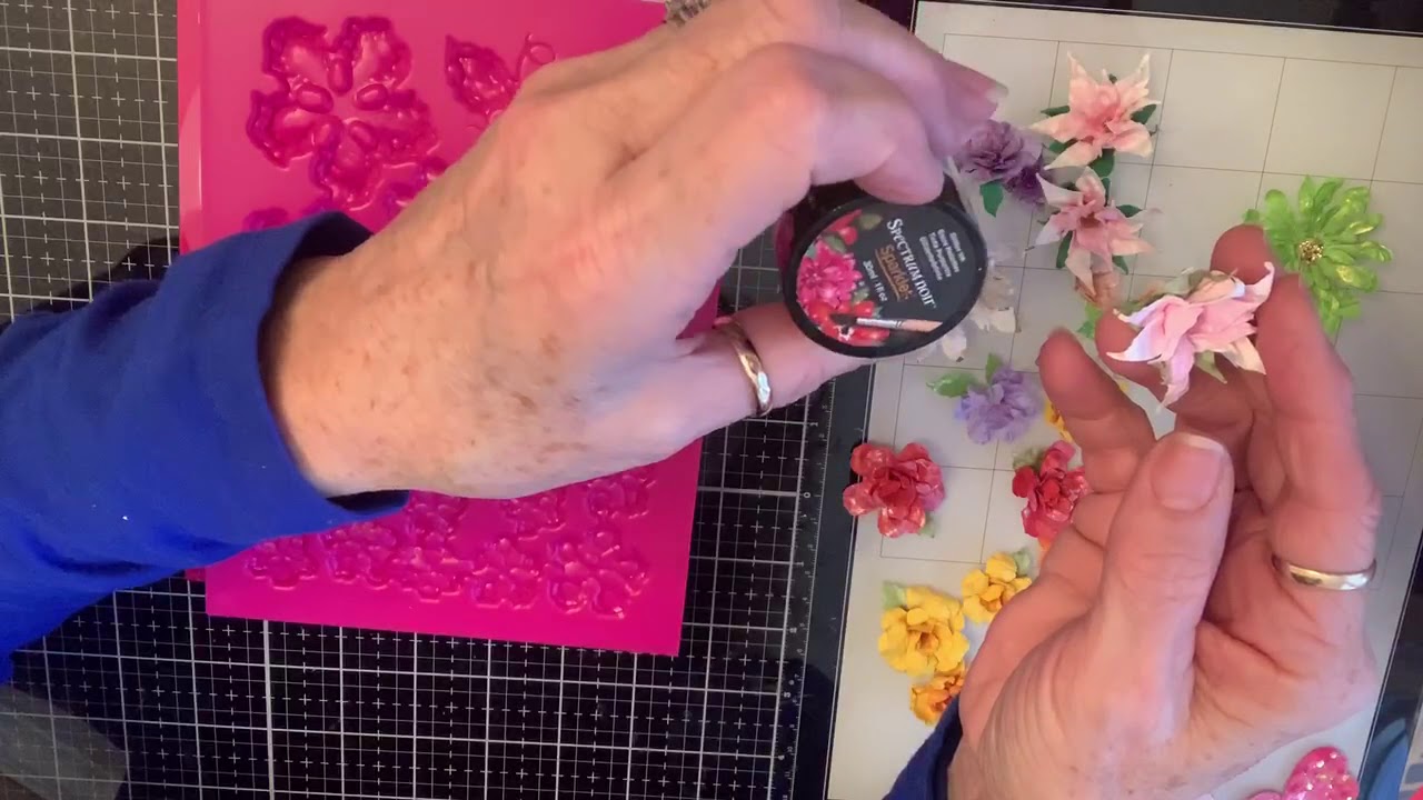 I’ve been making more flowers. Misty, show us your tricks, please ...