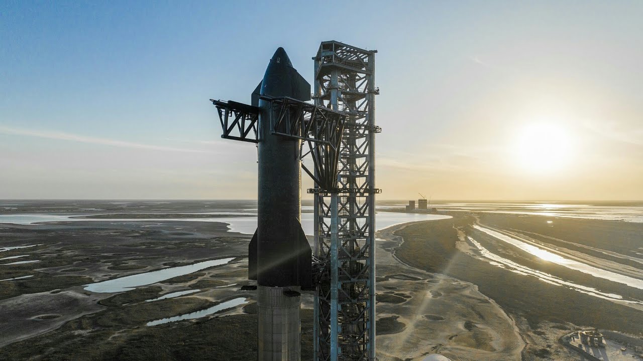 Launch and catch tower at Starbase destacking Starship | Use 🎧 for ...