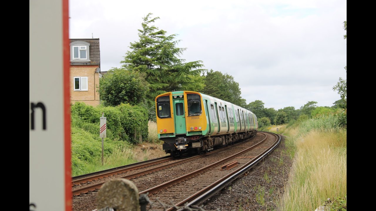 313205 and 313211 speed pass Brook lane to Eastleigh for scrap the last ...